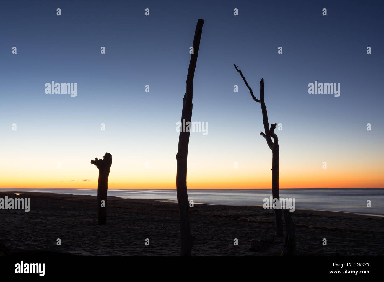 The sun rises across the Atlantic Ocean from east Long Island, New York ...