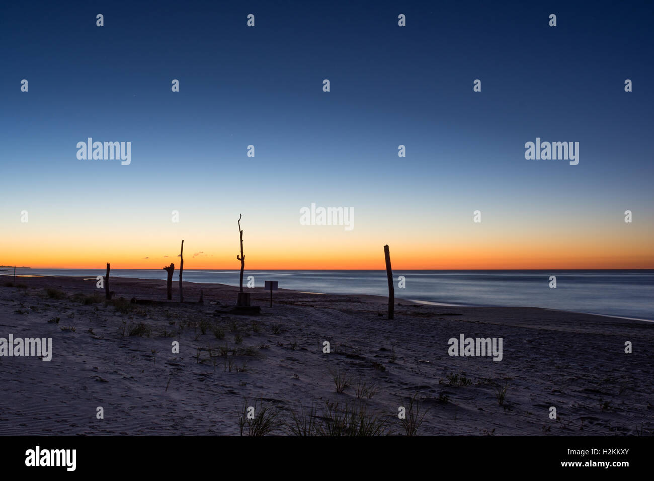 The sun rises across the Atlantic Ocean from east Long Island, New York ...
