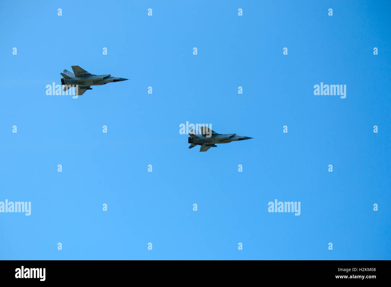fighter flight against the blue sky Stock Photo - Alamy