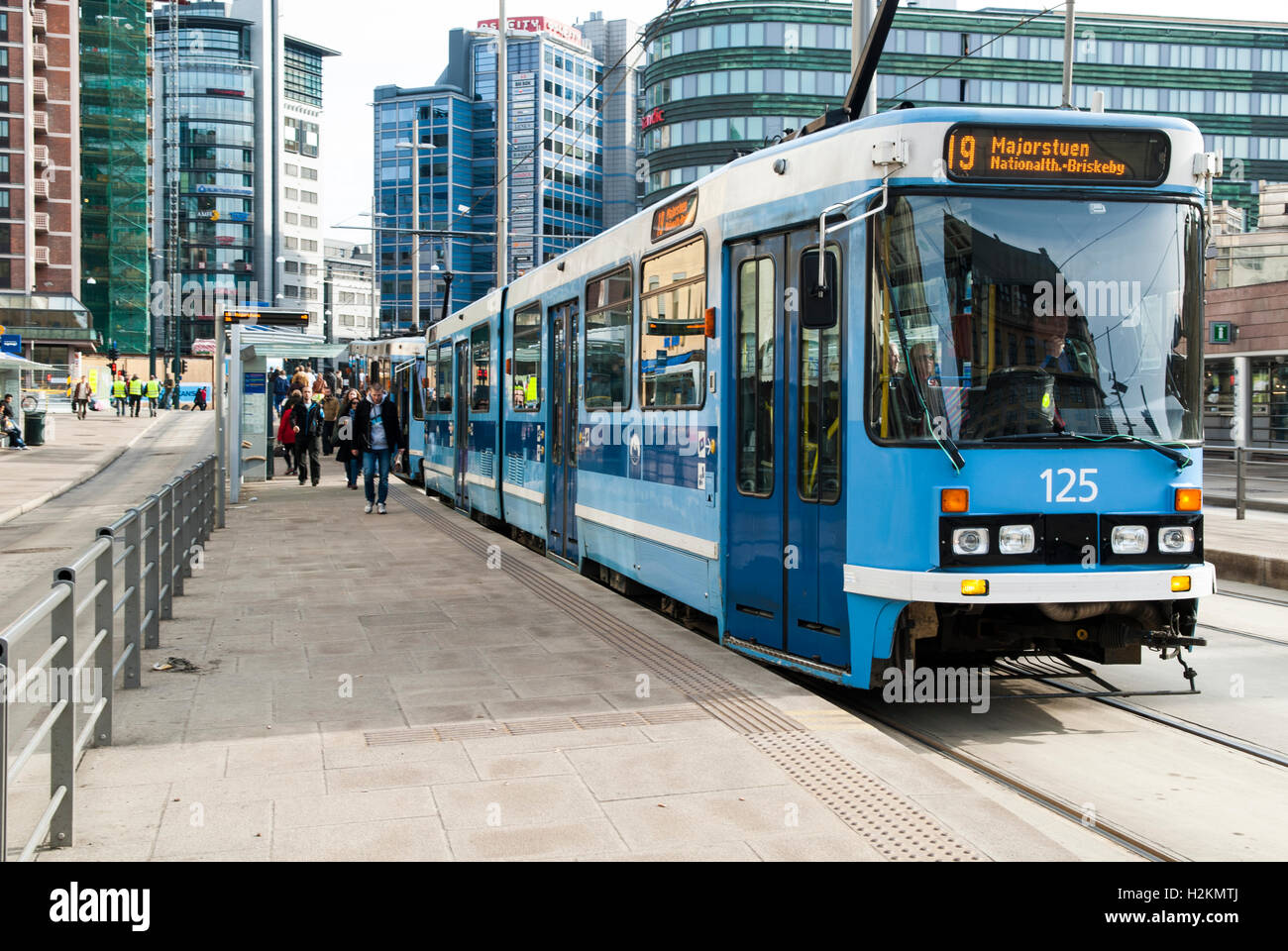 Tram and commuters Oslo Norway Stock Photo - Alamy