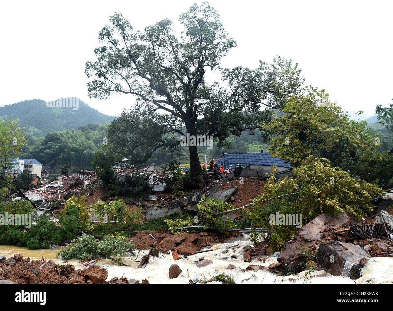 Suichang, China's Zhejiang Province. 29th Sep, 2016. Rescuers work at ...