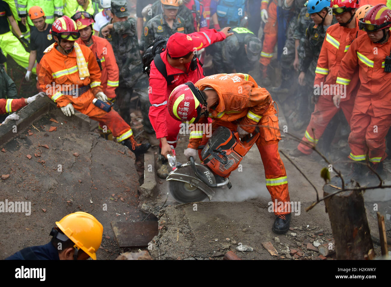 Lishui, China's Zhejiang Province. 29th Sep, 2016. Rescuers search for ...