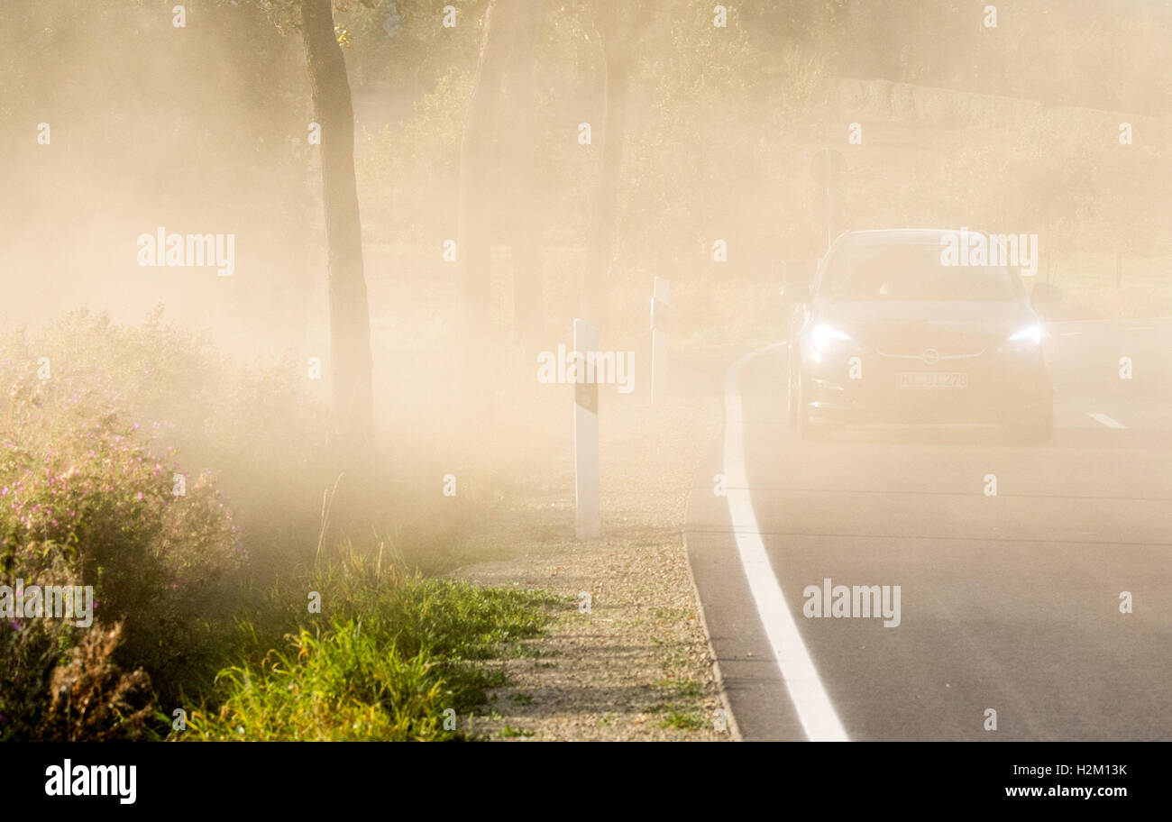 Sehnde, Germany. 29th Sep, 2016. A car driving along a country road ...