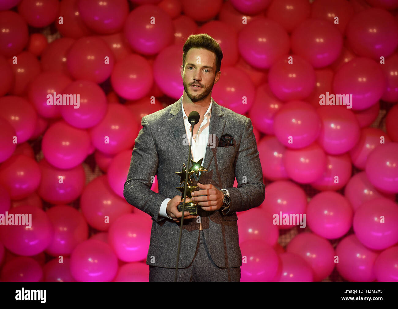 Duesseldorf, Germany. 29th Sep, 2016. Influencer Daniel Fuchs accepts ...