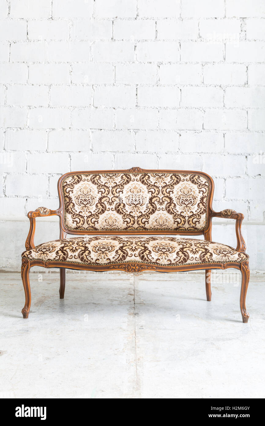 Brown Classical style sofa couch in vintage room Stock Photo - Alamy
