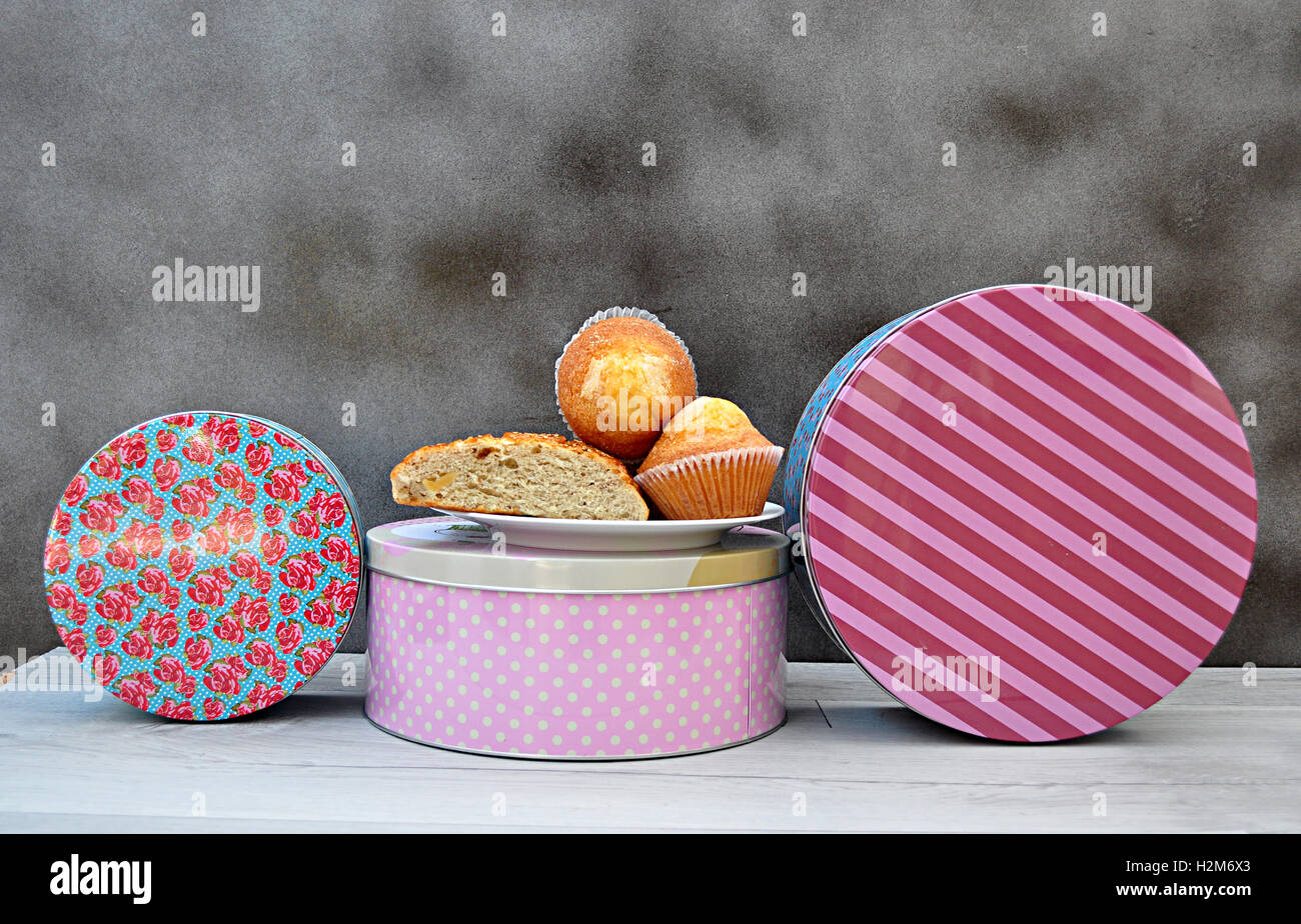 metal containers for sweets muffins and sweet bread Stock Photo - Alamy