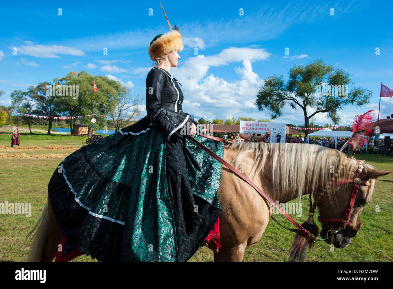 Horse riders in historical costumes during an open-air event in Pultusk ...
