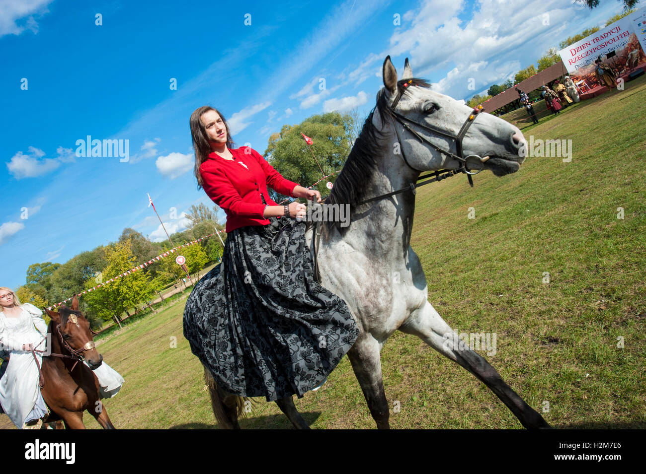 Horse riders in historical costumes during an open-air event in Pultusk ...