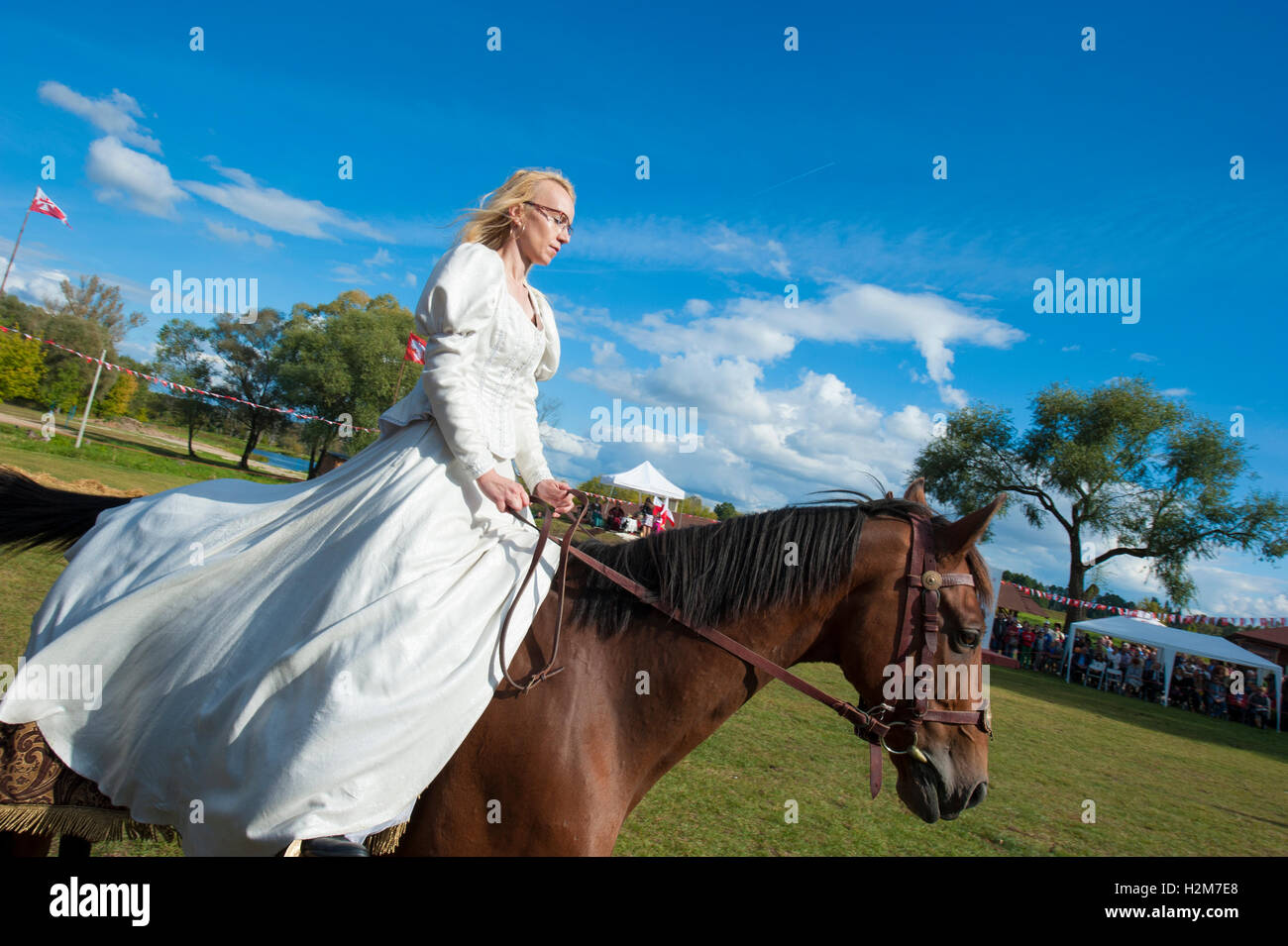 Horse riders in historical costumes during an open-air event in Pultusk ...
