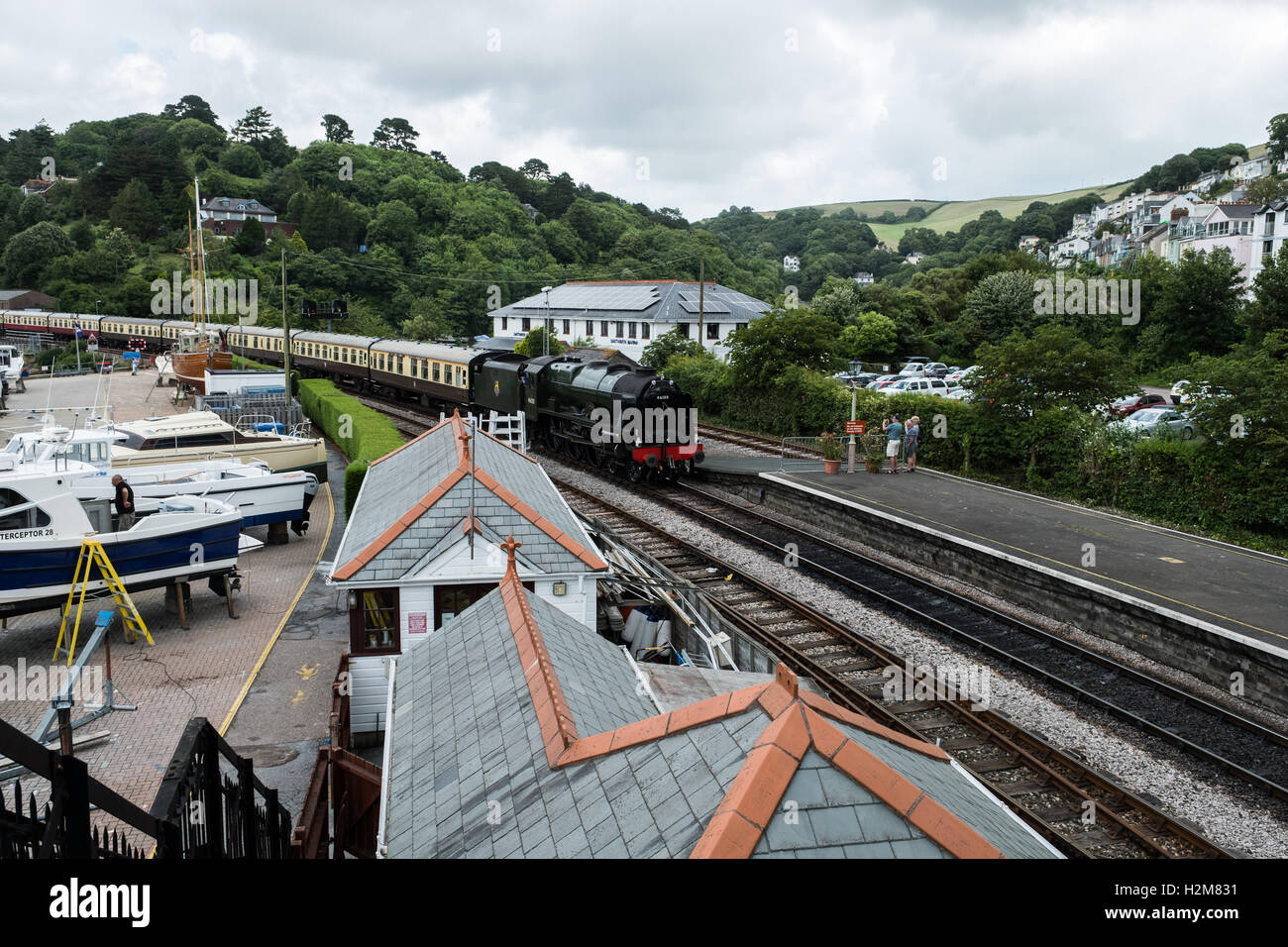 A Steam Locomotive passenger train at Kingswear Station, Devon, England ...
