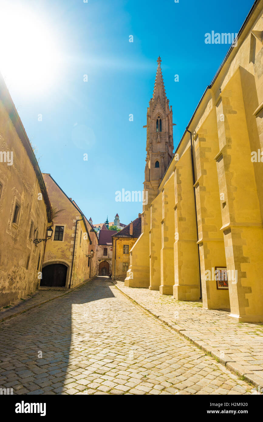 A street with traditional buildings in Bratislava, Slovakia Stock Photo ...