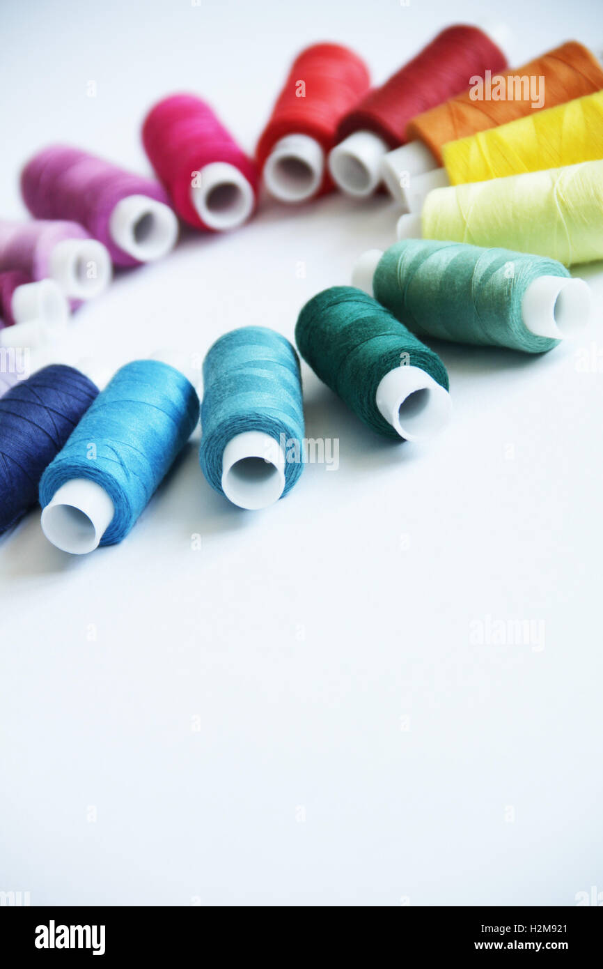 Sewing threads of different colors in beautiful pattern Stock Photo - Alamy