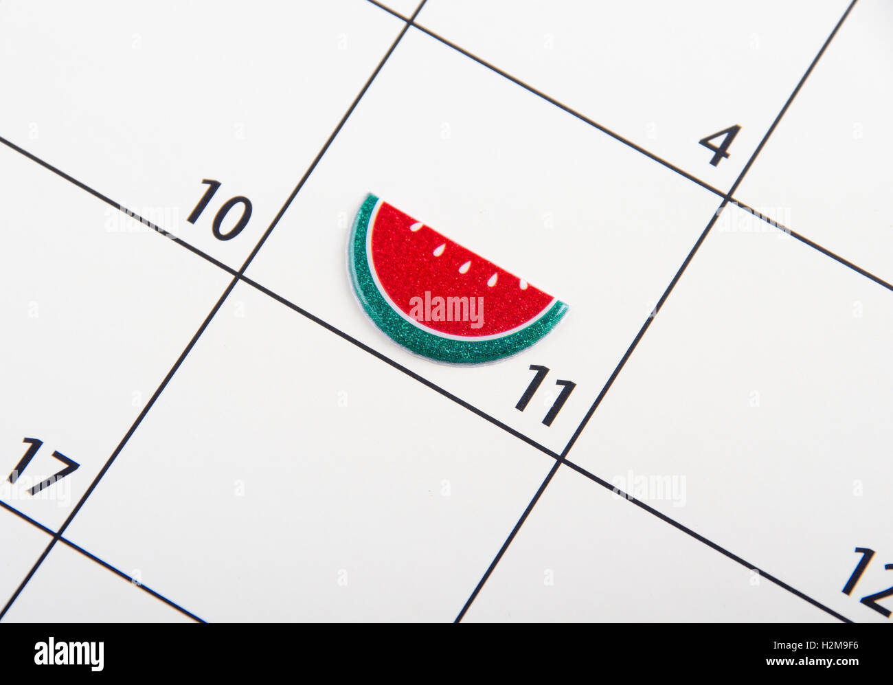close up of a calendar marked date with sticker Stock Photo - Alamy