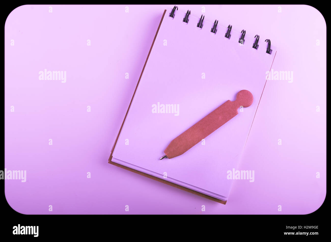pen lying on opened notebook. color toning Stock Photo - Alamy