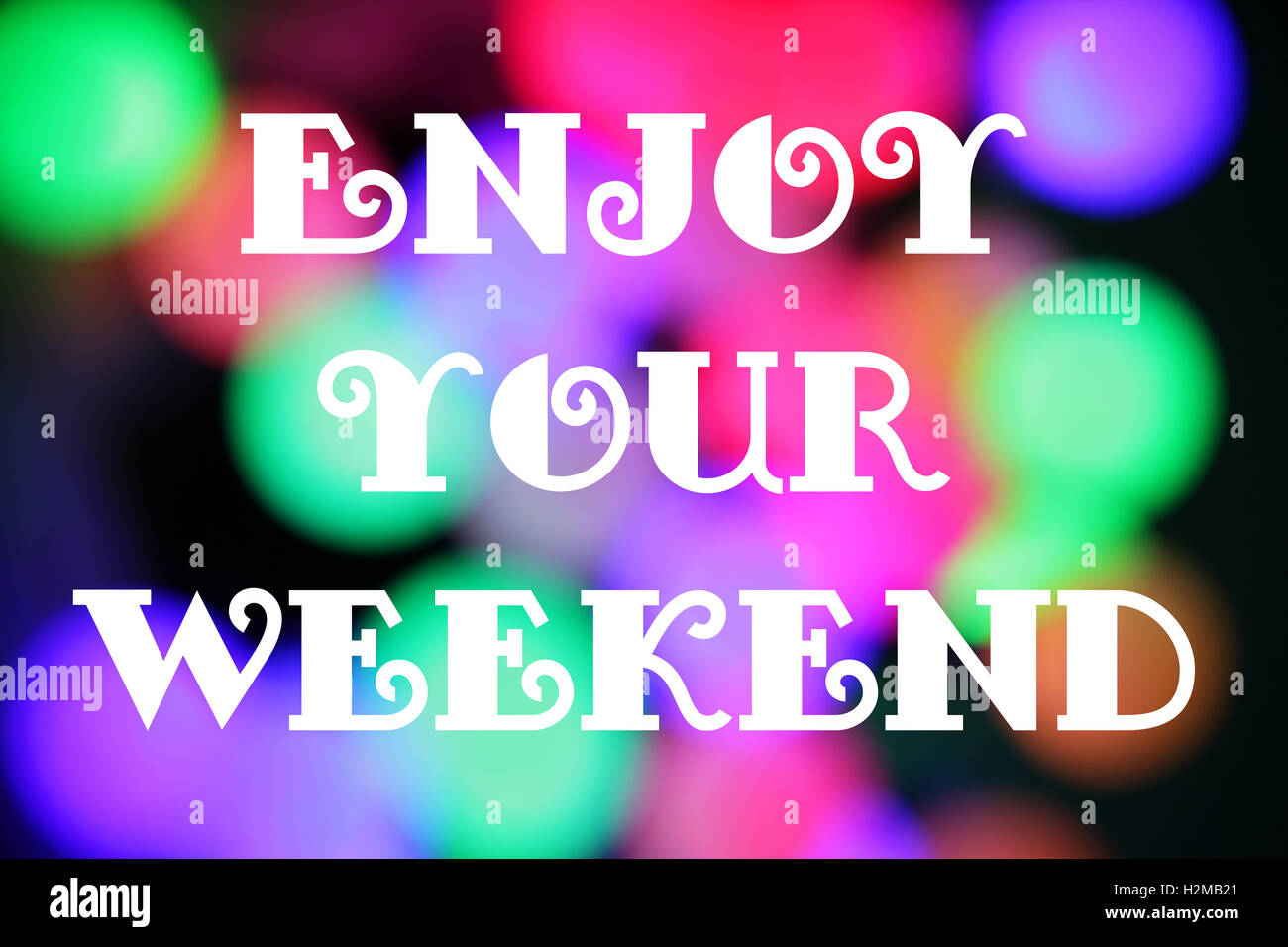 Bright blured background with text: Enjoy your weekend Stock Photo - Alamy