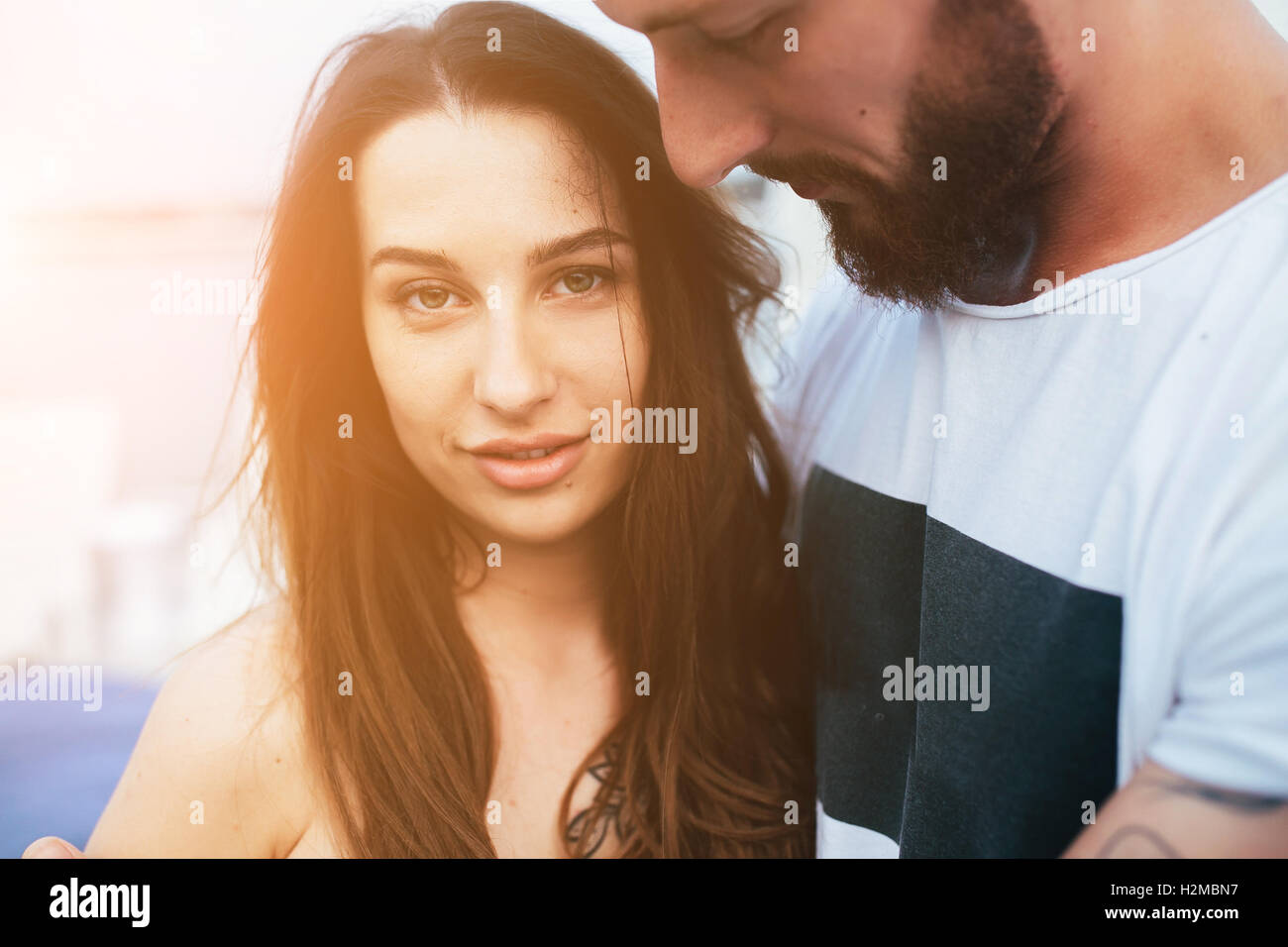 beautiful couple close-angle pose for the camera Stock Photo - Alamy