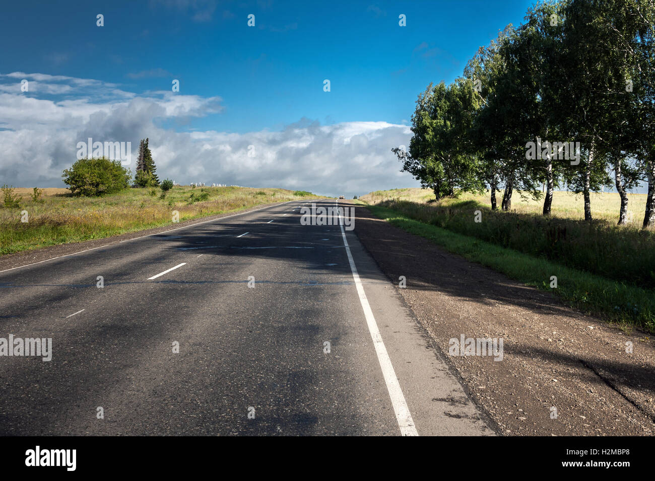 the country highway with a roadside landscape Stock Photo - Alamy