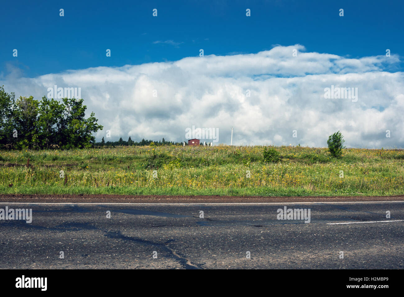 the country highway with a roadside landscape Stock Photo - Alamy
