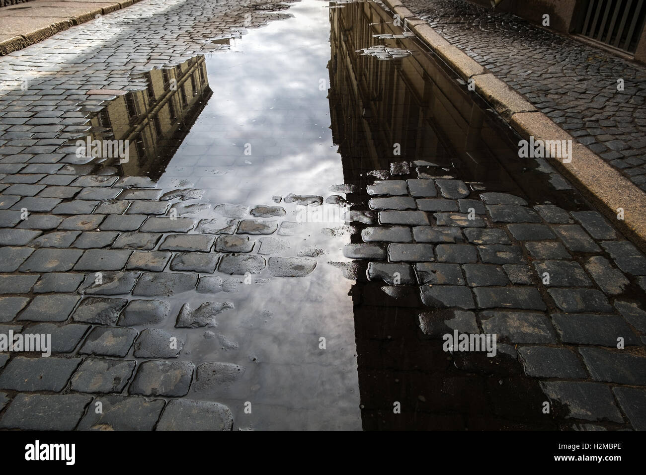 ancient pavement with reflection in water Stock Photo - Alamy