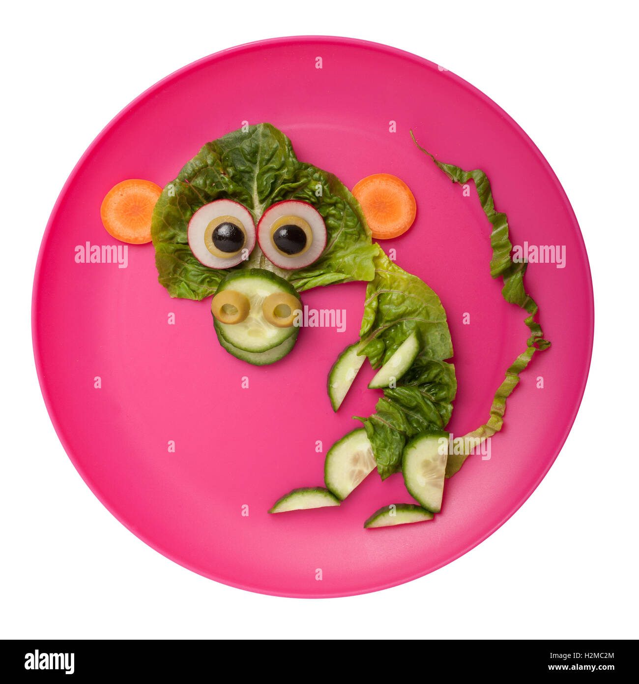 Amusing monkey made of vegetables on plate Stock Photo - Alamy