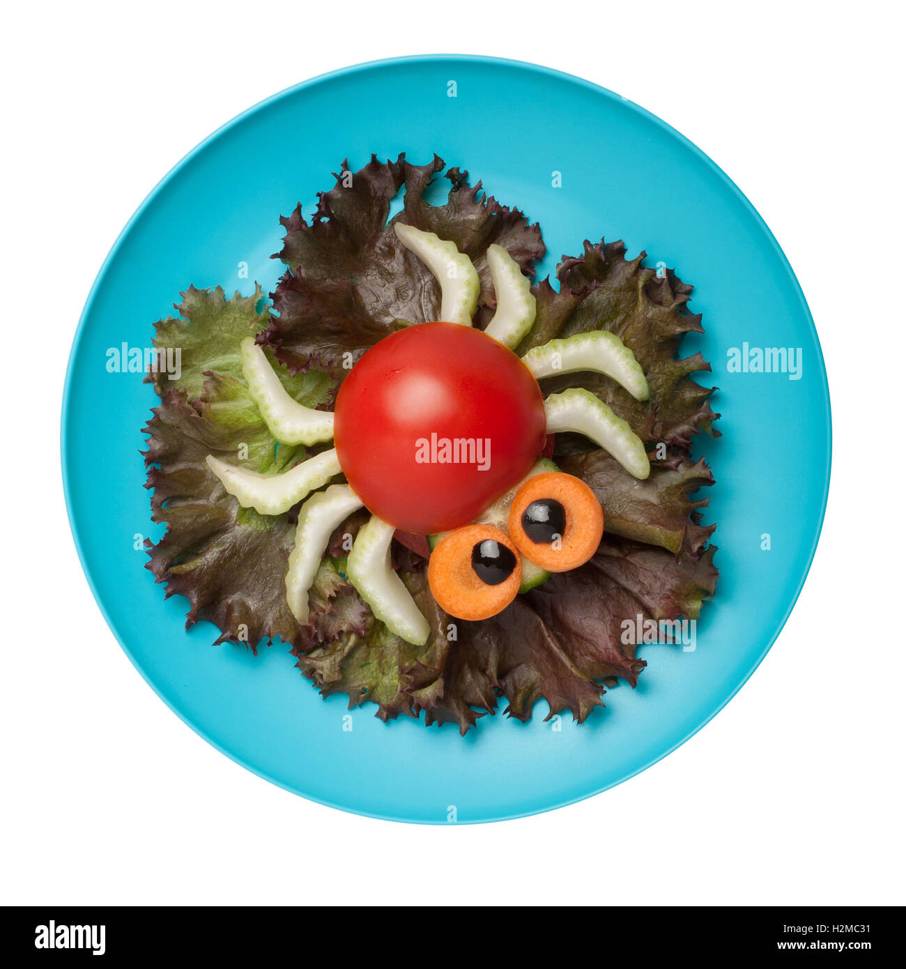 Amusing spider made of vegetables on plate Stock Photo - Alamy