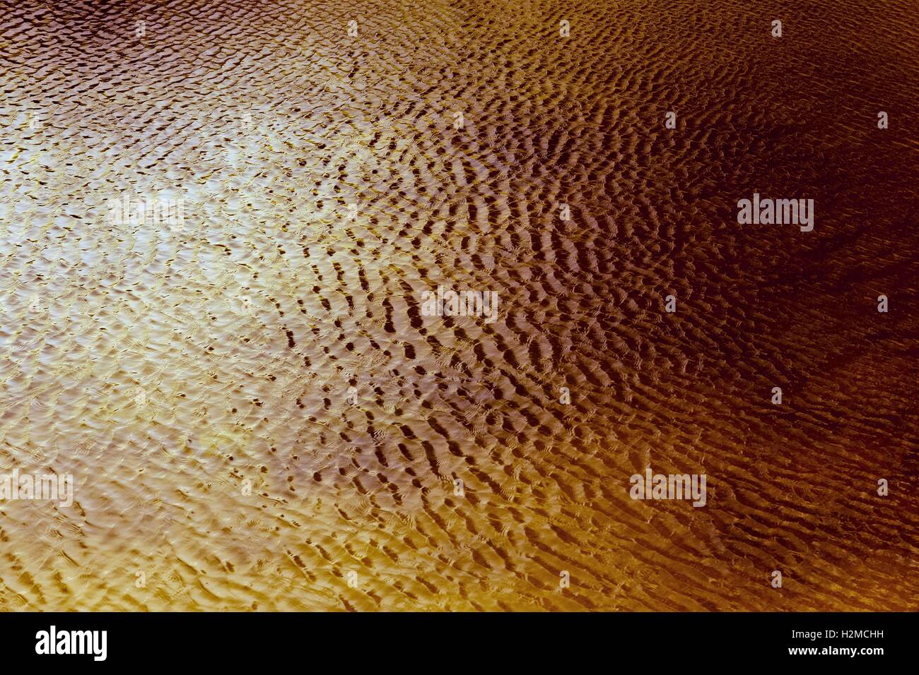 Gold water ripples hi-res stock photography and images - Alamy
