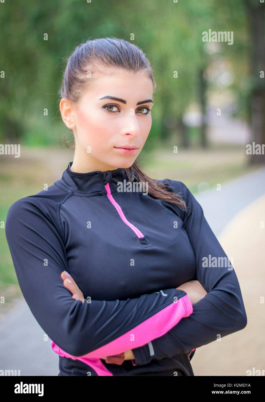 Young Female Fitness Trainer Poses During Cross Fit Break Outdoor Stock