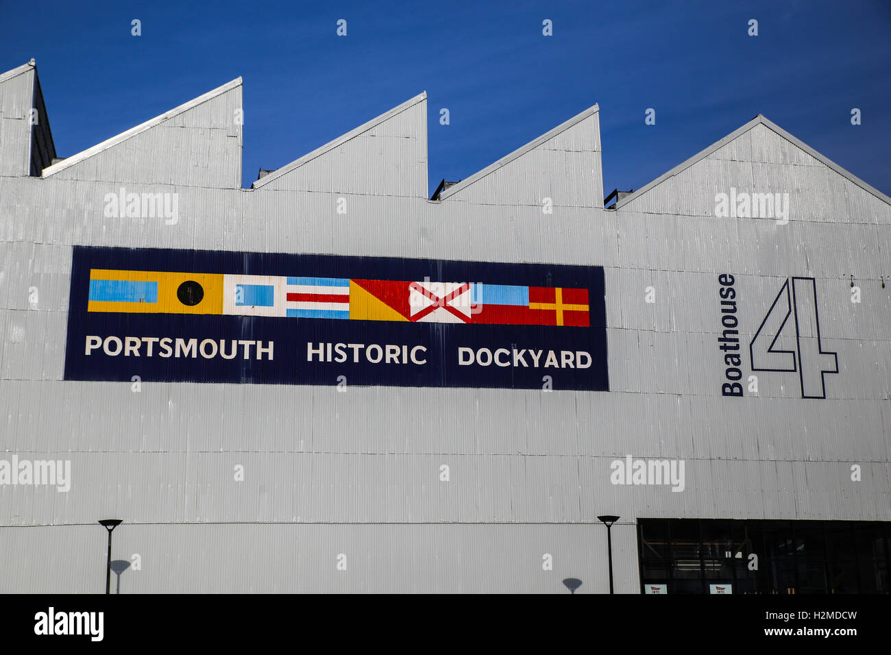 Portsmouth Historic Dockyard sign Stock Photo - Alamy