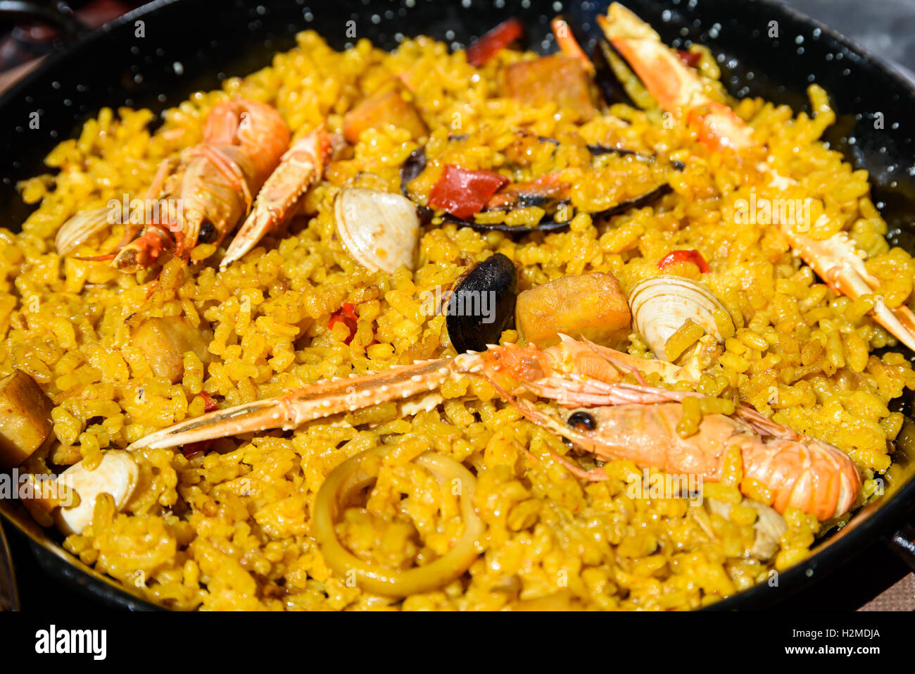 Traditional Valencian Paella With Rice And Seafood Stock Photo - Alamy