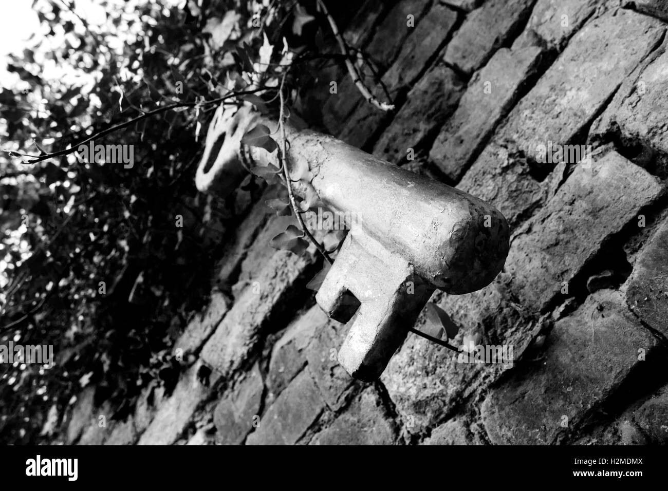 Metal hanging sign Black and White Stock Photos & Images - Alamy