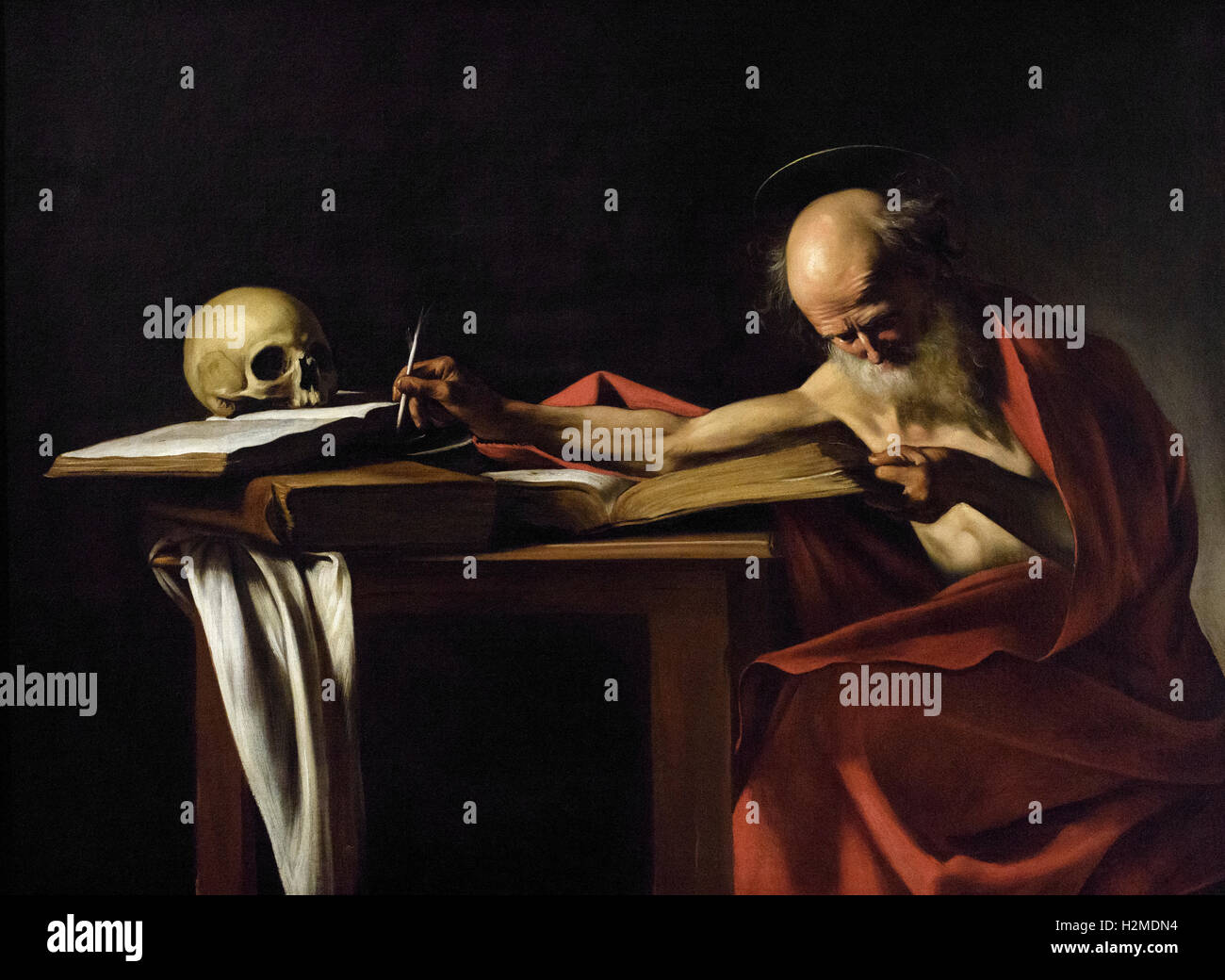 St jerome in his study caravaggio hi-res stock photography and images ...