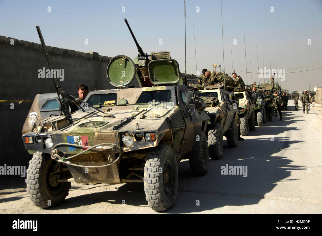 French soldiers prepare VBL armoured vehicles before departing in a ...