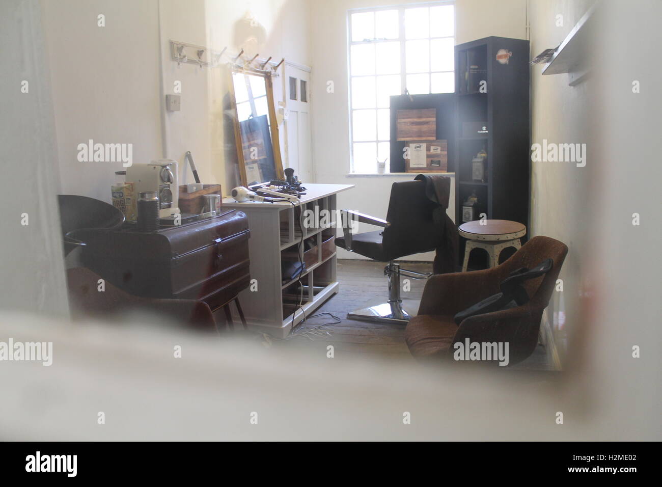 Looking through the window of a small hairdressing salon Stock Photo ...