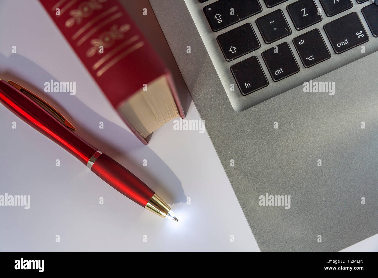 Pen,Red Book and Laptop Stock Photo - Alamy