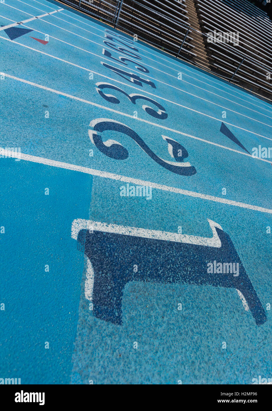 Blue and white Running track Stock Photo - Alamy