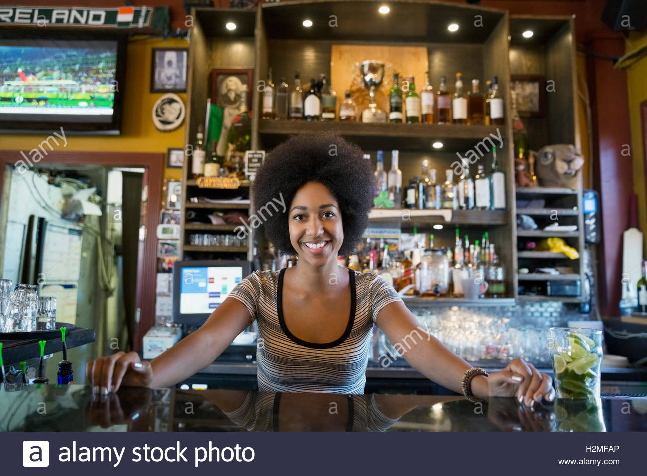 Bartender behind the counter hi-res stock photography and images - Alamy