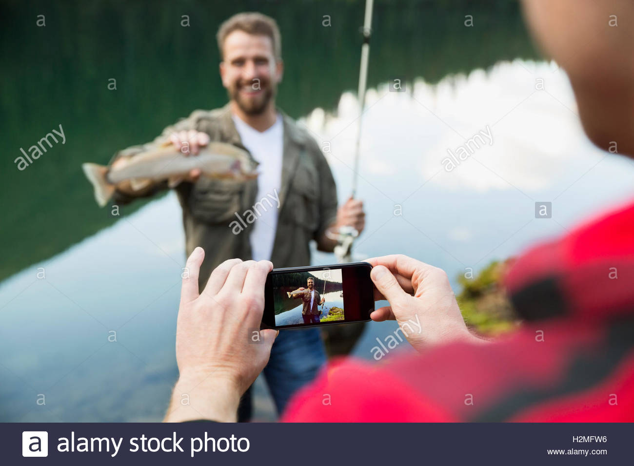 Fish catching man hi-res stock photography and images - Alamy