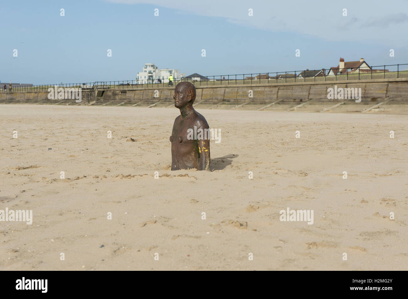 Statue of man on beach Stock Photo - Alamy