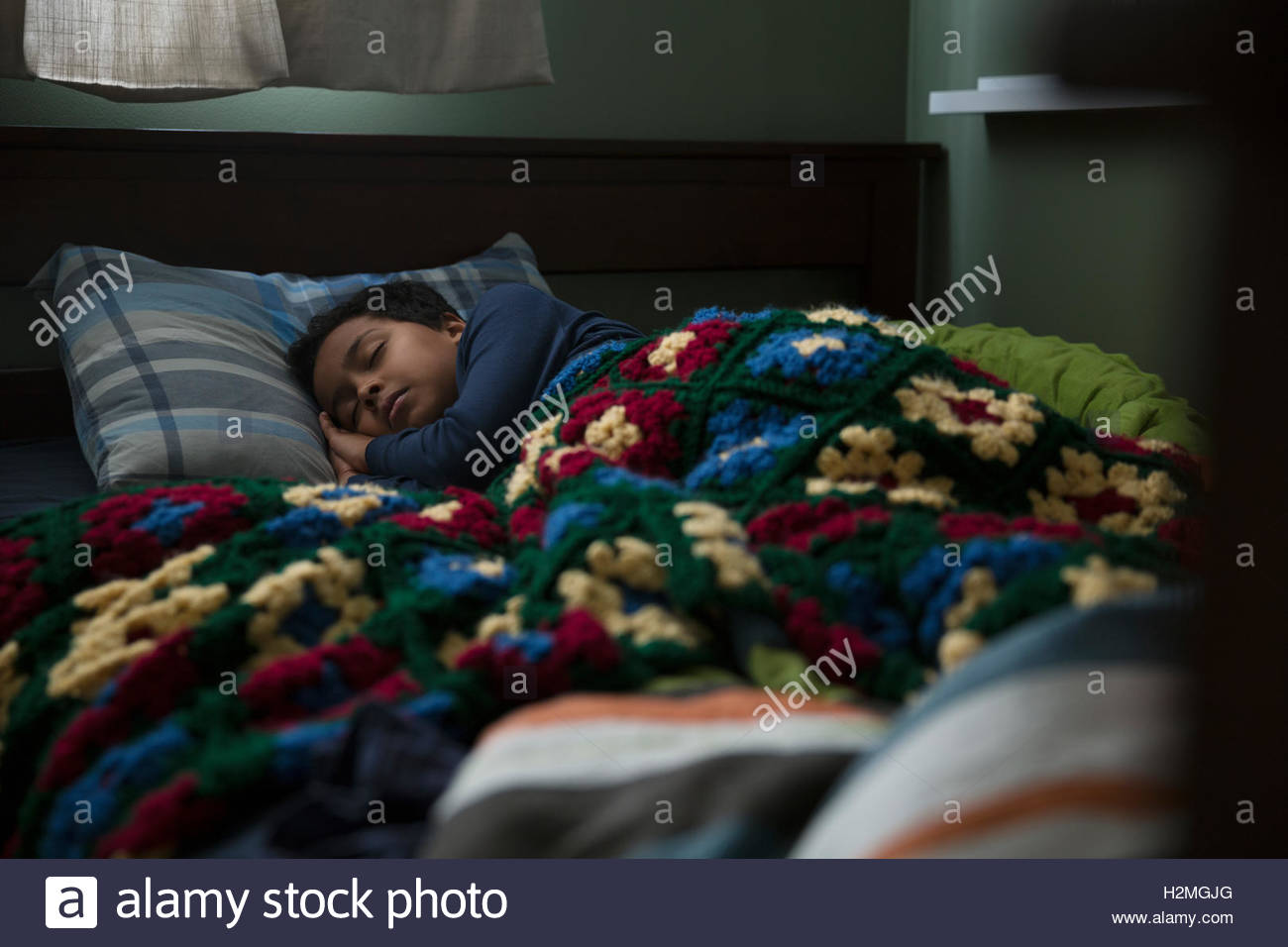 Boy in bed sleeping hi-res stock photography and images - Alamy
