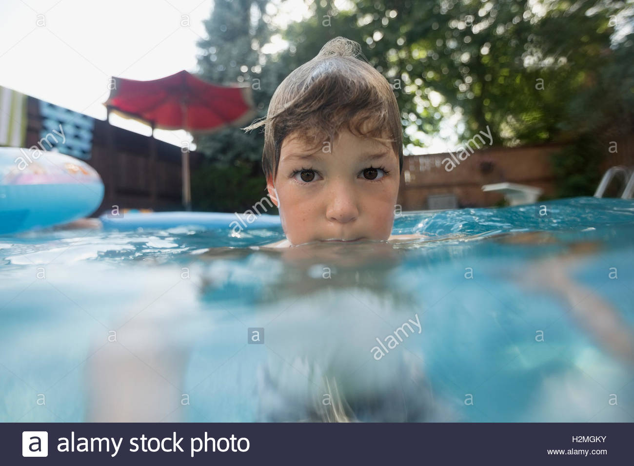 Boy at the pool hi-res stock photography and images - Alamy
