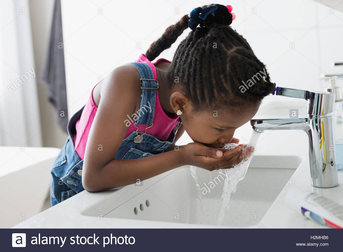 Drinking from water faucet hi-res stock photography and images - Alamy