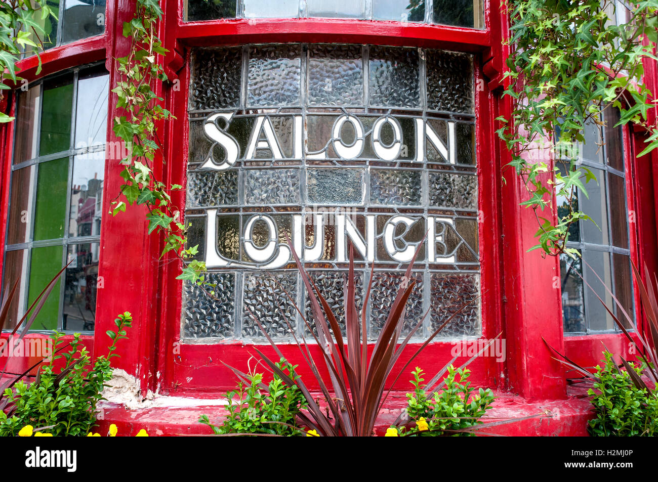 A leaded glass saloon lounge pub window in Brighton Stock Photo - Alamy