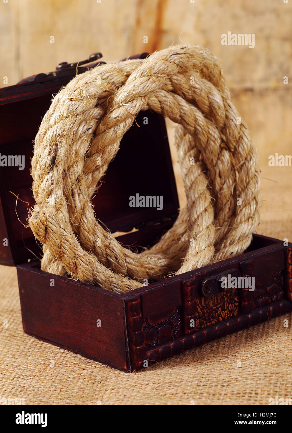 vintage chest with the rope Stock Photo - Alamy