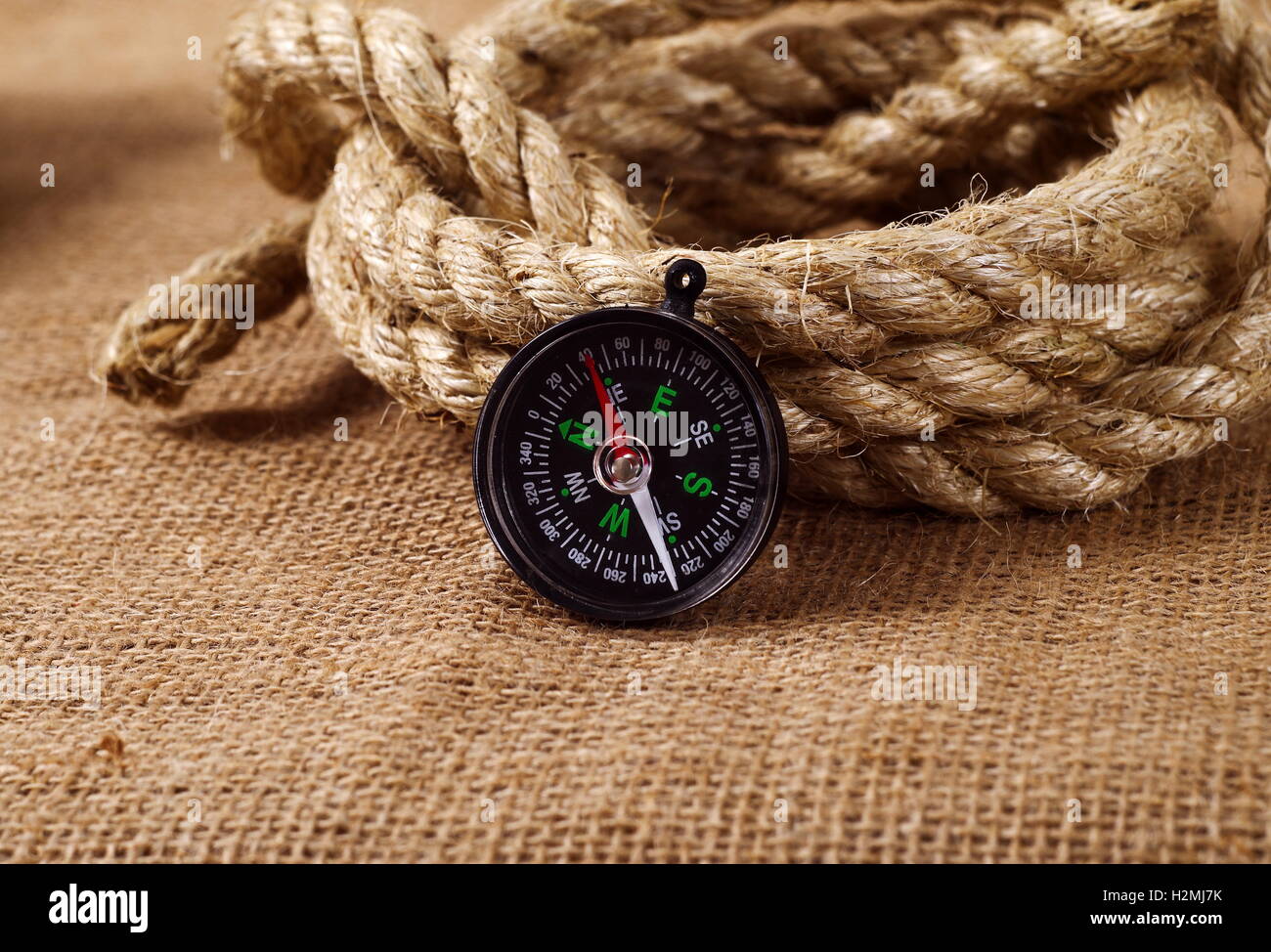 vintage objects,rope and compass Stock Photo - Alamy