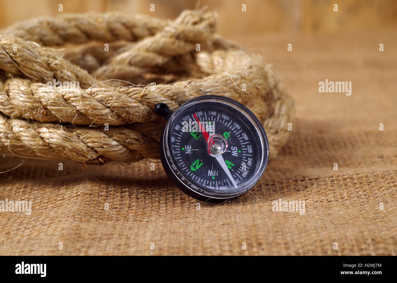 vintage objects,rope and compass Stock Photo - Alamy