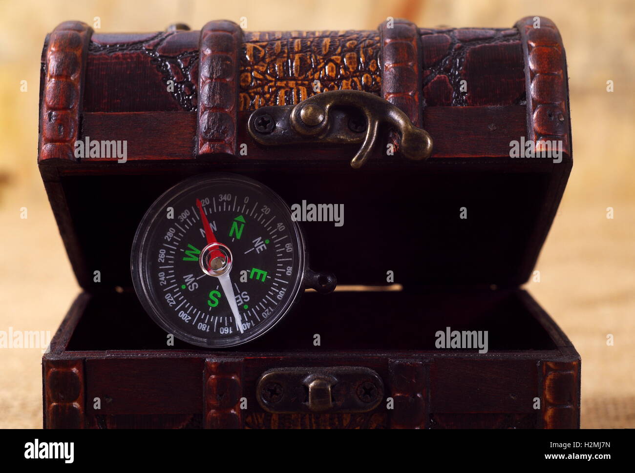 vintage treasure chest with compass Stock Photo - Alamy