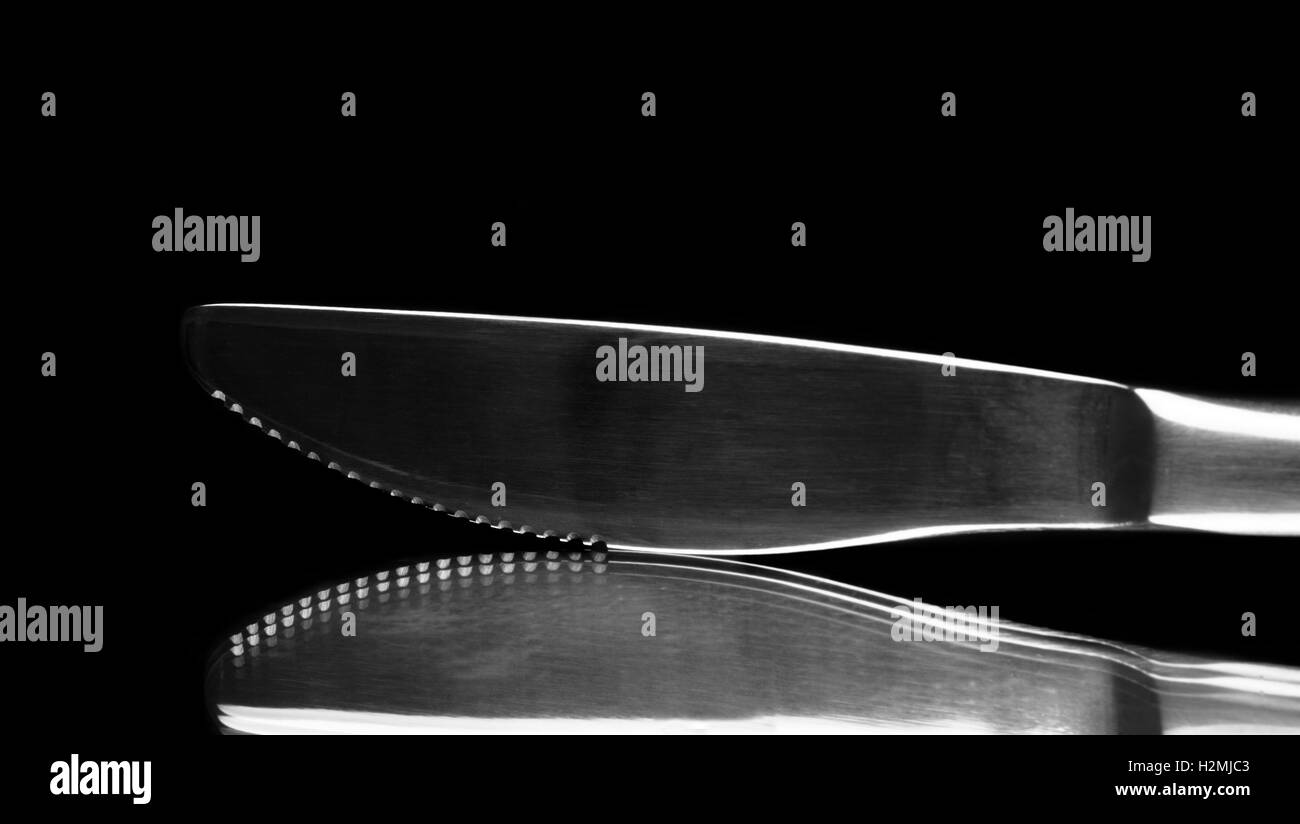 steel knife closeup on black Stock Photo - Alamy