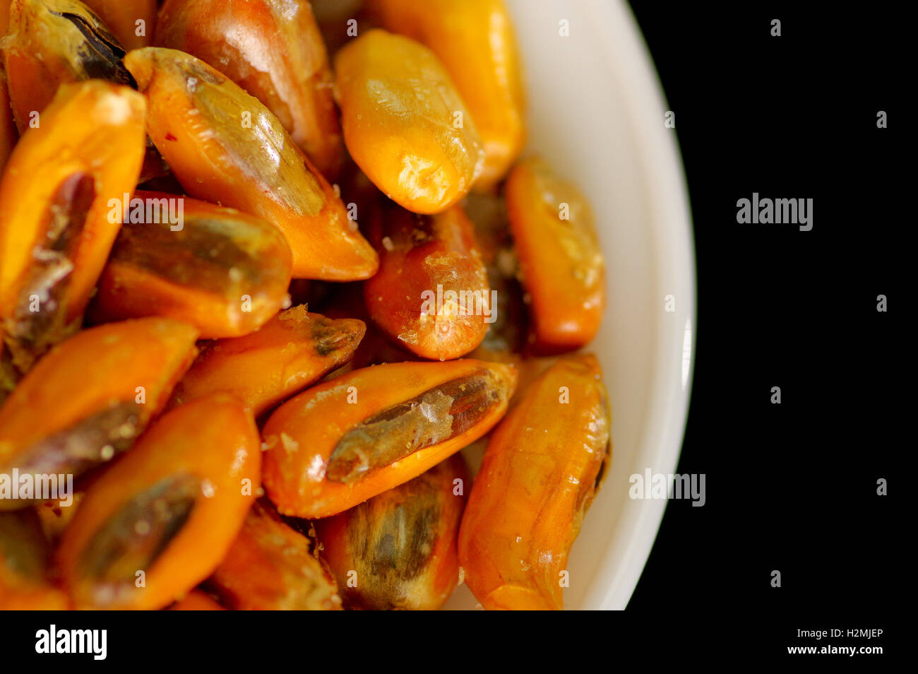 Small white bowl of delicious fried chochos, south american specialty ...