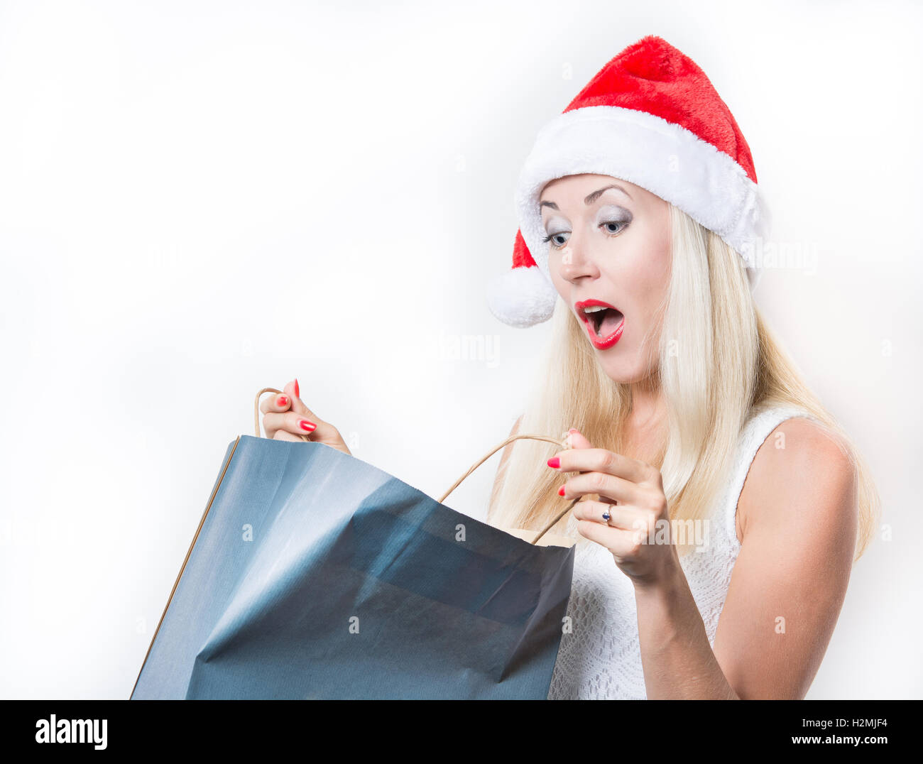 nice girl surprised by the gift Stock Photo - Alamy