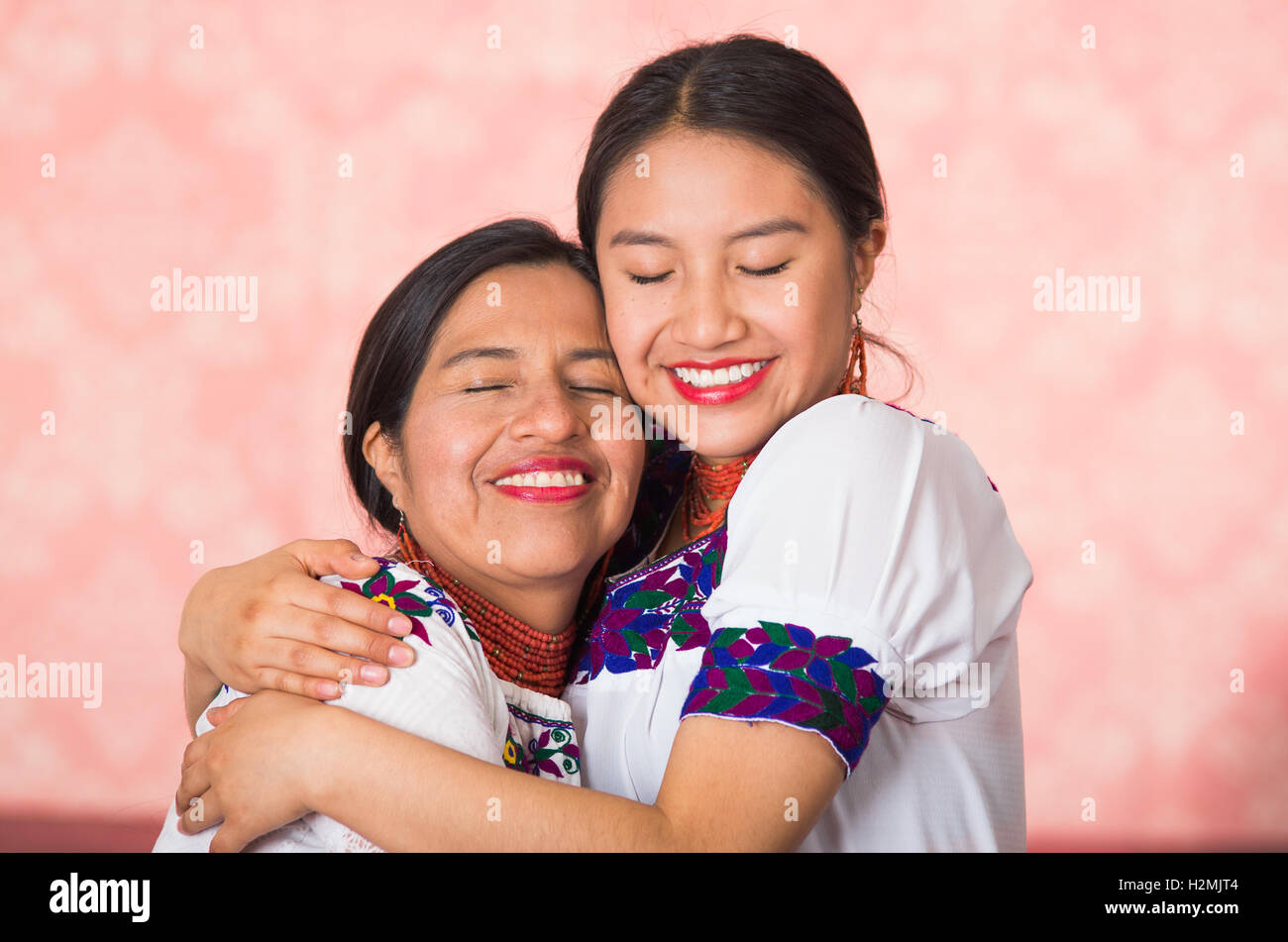 Beautiful hispanic mother and daughter wearing traditional andean ...